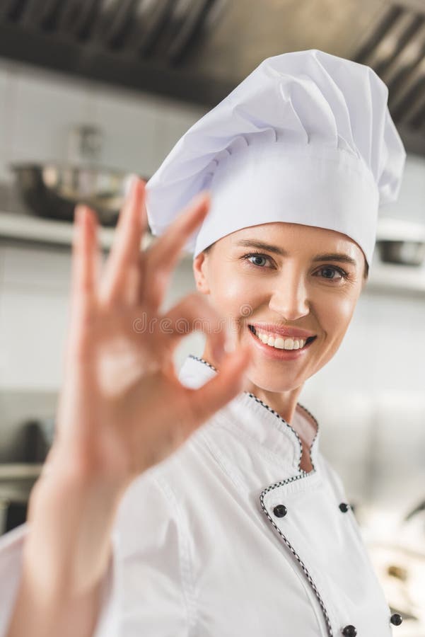 Attractive Chef Reading Recipe and Showing Idea Gesture Stock Image ...