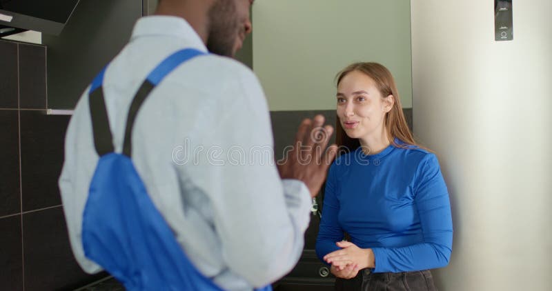 Attractive Client Female Explaining Problems To Black Hardworking ...