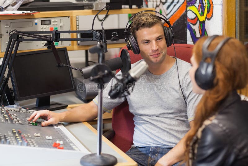 Attractive Content Radio Host Interviewing a Guest Stock Image - Image ...