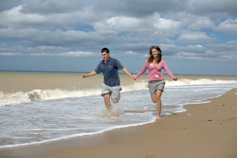 Attractive Couple at the Sea Stock Image - Image of face, coast: 23025349