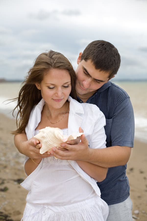 Attractive Couple at the Sea Stock Image - Image of relaxation, couple ...