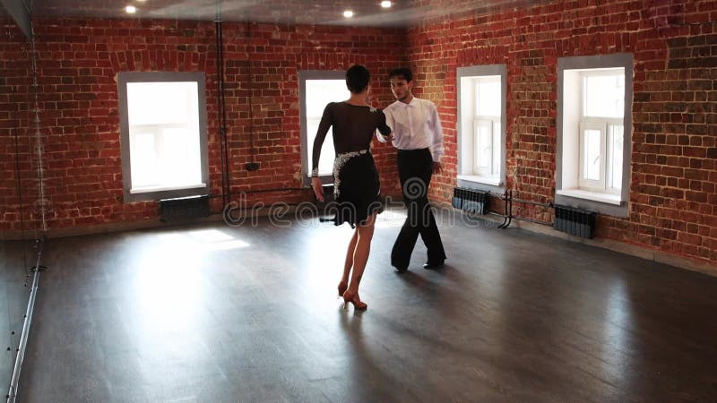 An Attractive Couple Training Dancing Elements in the Room Stock ...