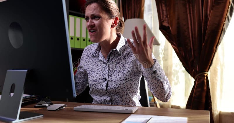 Attractive Crazy Business Woman with an Angry Expression Looks at ...