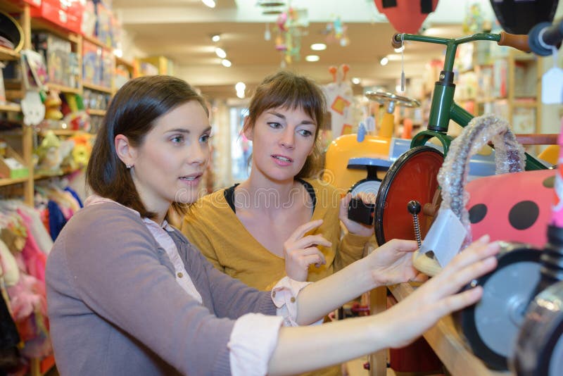 Attractive Customer and Seller at Toy Store Stock Image - Image of ...