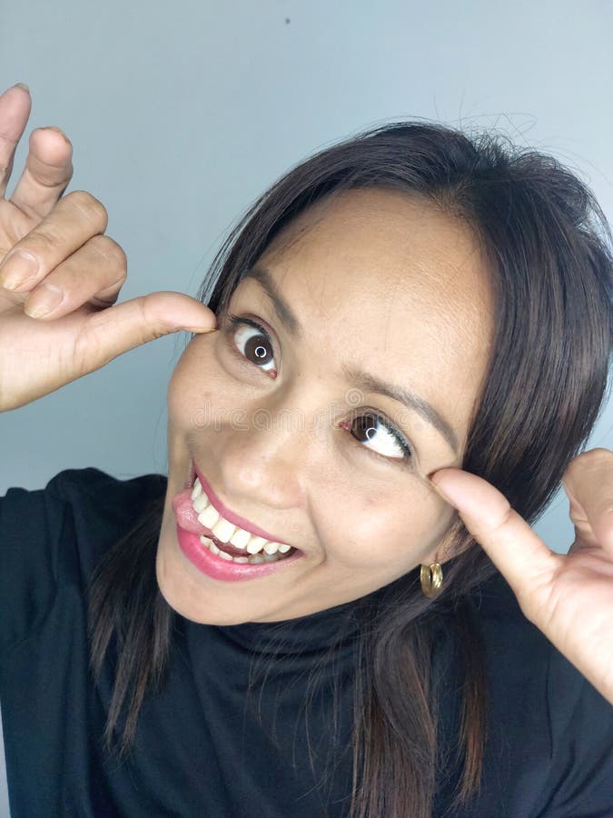 Attractive Diverse Female Making Funny Faces Isolated Stock Photo ...