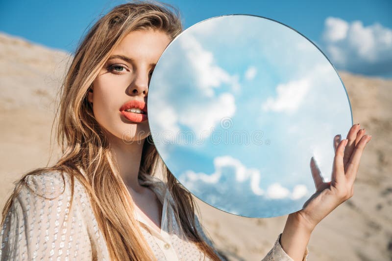 Attractive Elegant Model Holding Round Mirror with Reflection of Stock ...