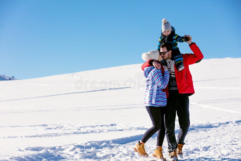 Attractive Family Having Fun in a Winter Park on Mountain Stock Image ...