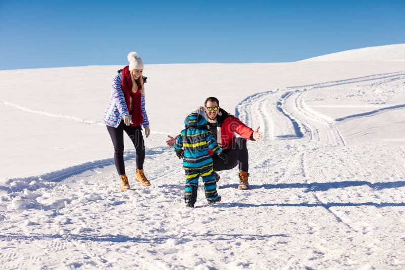 Attractive Family Having Fun in a Winter Park on Mountain Stock Image ...