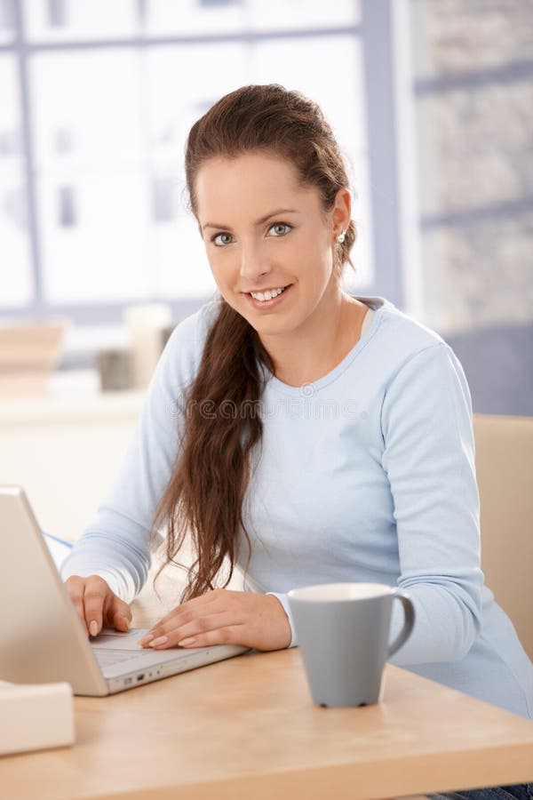 Attractive Female Browsing Internet at Home Stock Image - Image of face ...
