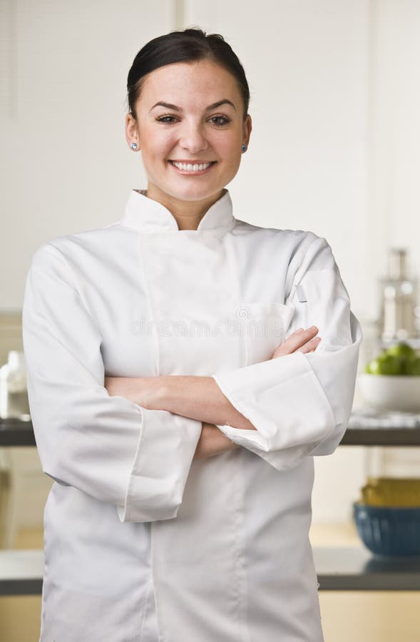 Attractive female chef. stock image. Image of midlife - 10321123