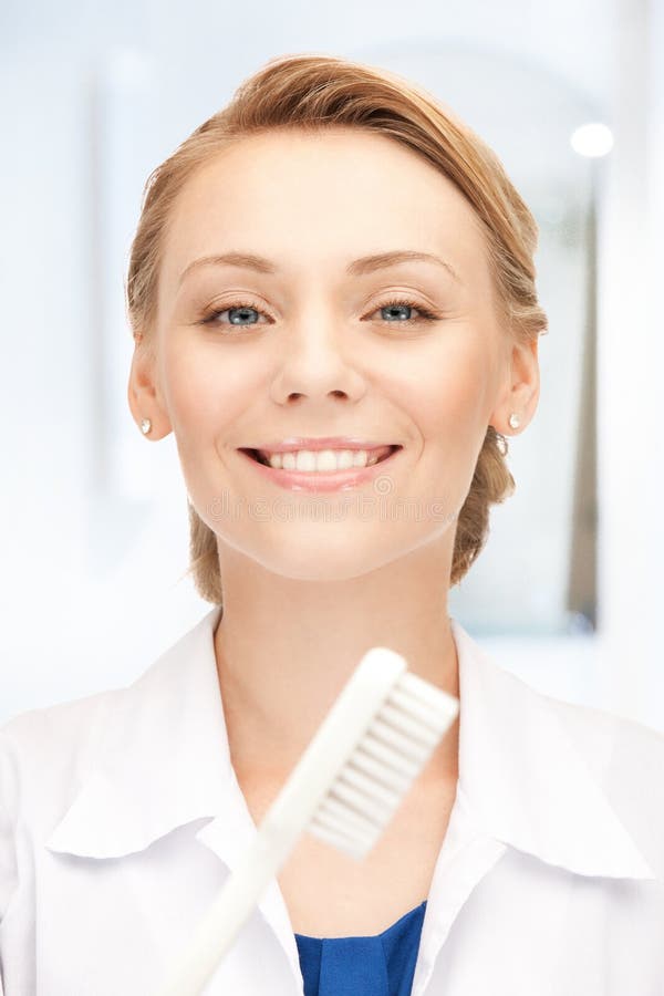 Attractive Female Doctor with Toothbrush Stock Image - Image of ...