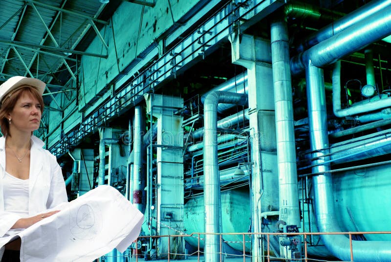 Female Engineer with Blueprints on Factory Stock Image - Image of ...