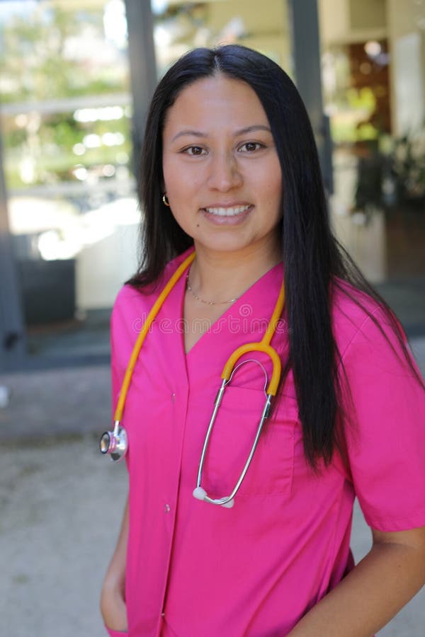 Attractive Female Hispanic Doctor or Nurse Isolated Stock Image - Image ...