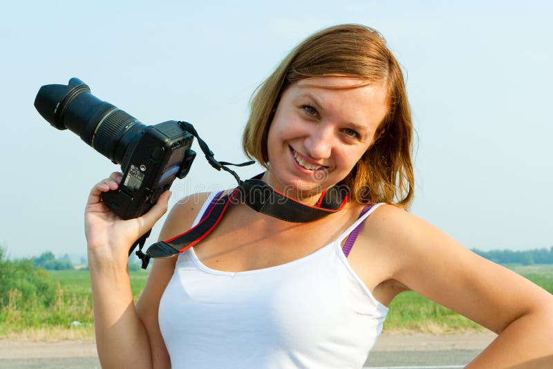 Attractive Female Photographer with Camera Stock Photo - Image of ...