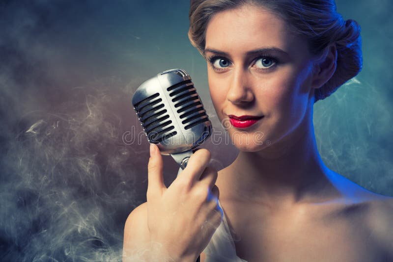 Attractive Female Singer with Microphone Stock Image - Image of event ...