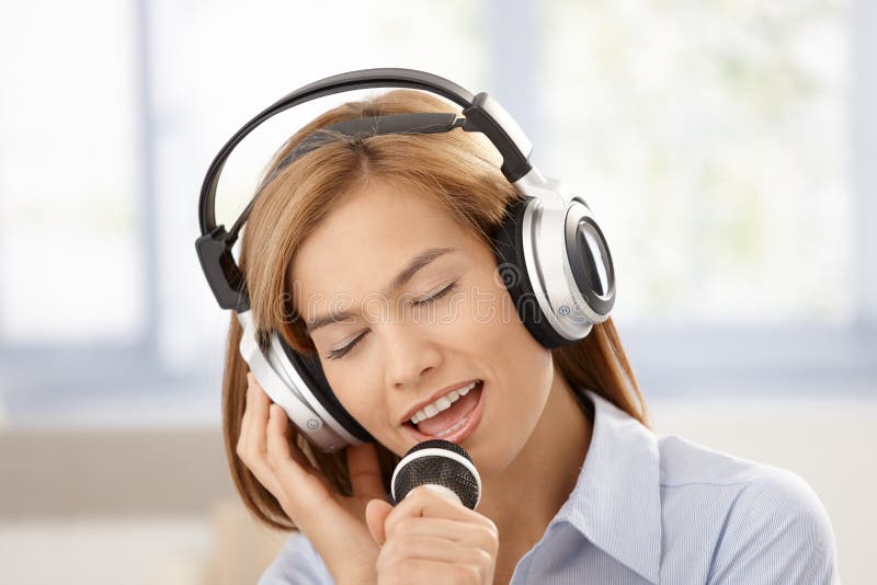Attractive Female Singing with Joy Smiling Stock Photo - Image of face ...