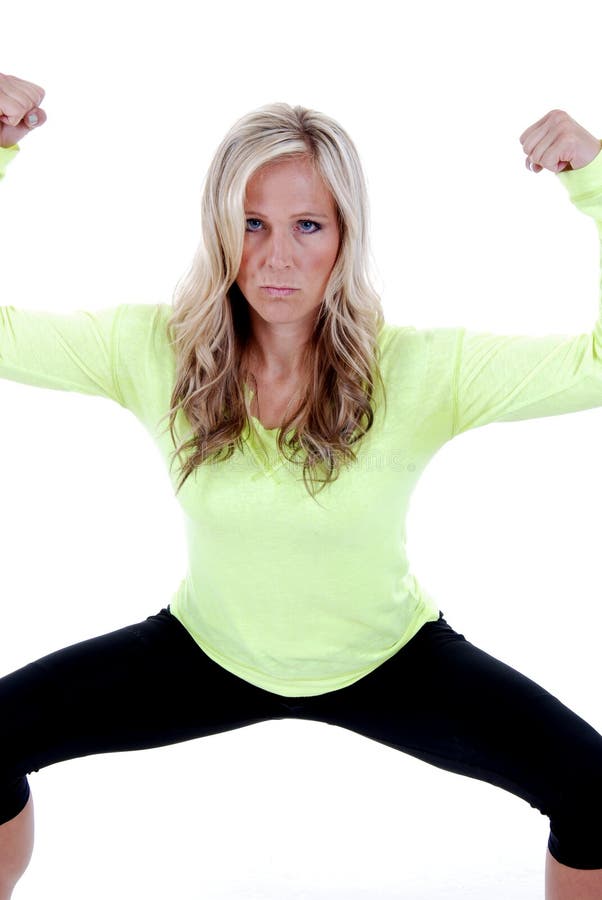 Attractive Fit Female Model Wearing a Green Top Flexing Stock Photo ...