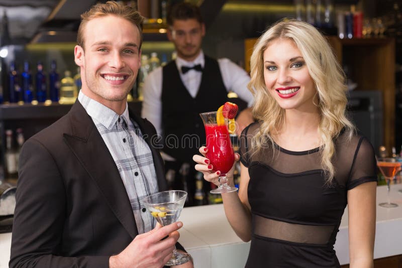 Attractive Friends Drinking Cocktails Together Stock Photo - Image of ...