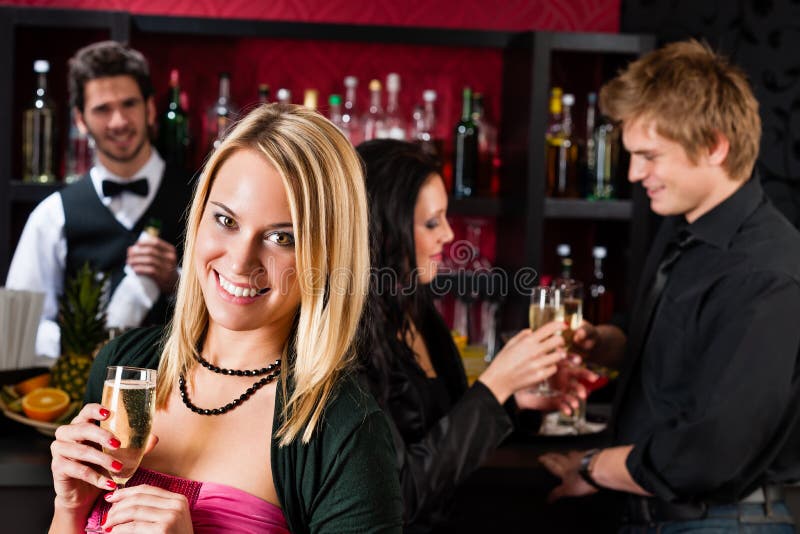 Attractive Girl at Bar Smiling with Friends Stock Image - Image of ...