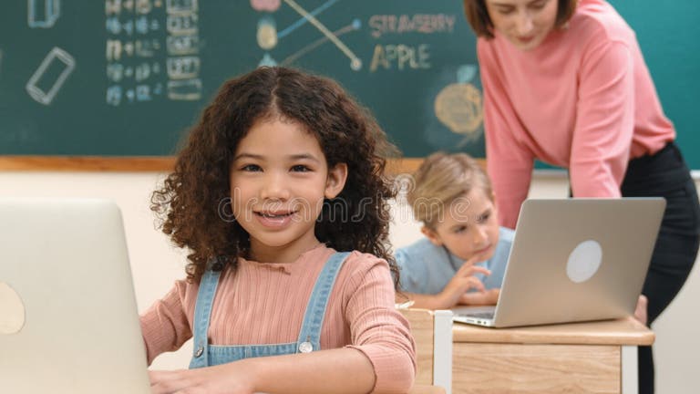 Attractive Girl Coding Prompt while Looking at Camera at STEM Class ...