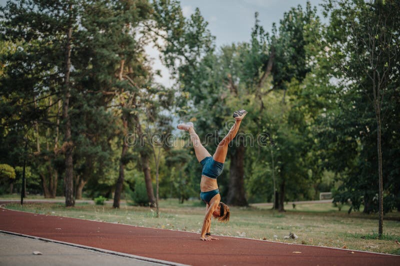 Girl Showcasing Flexibility and Strength with 360-degree Flips in an ...