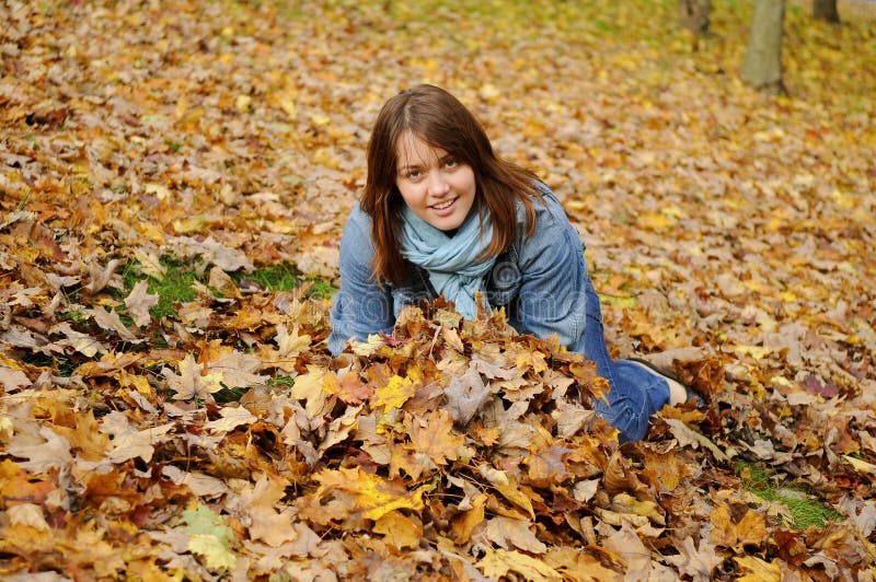 Attractive Girl in Fall Park Stock Image - Image of cheerful, teeth ...