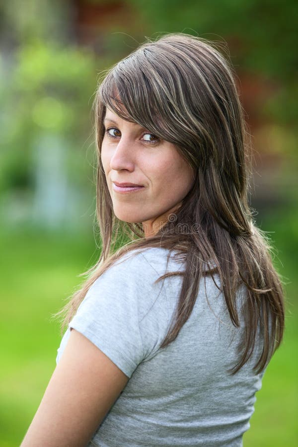 Attractive Girl Looking Back at Camera Stock Photo - Image of girl ...