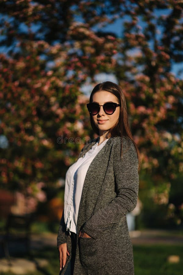 Attractive Girl Stand in Front of Beautiful Blooming Tree Stock Photo ...