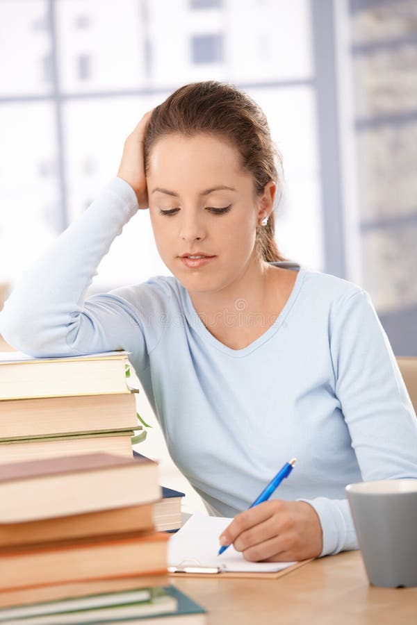 Attractive Girl Studying at Home for Exam Stock Photo - Image of campus ...