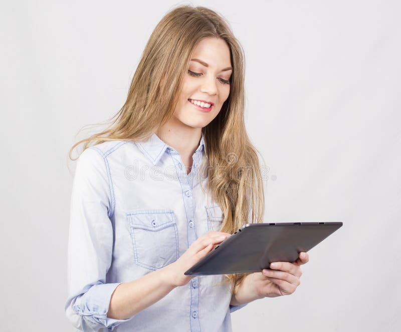 Attractive Girl with Tablet in Studio Stock Image - Image of touch ...