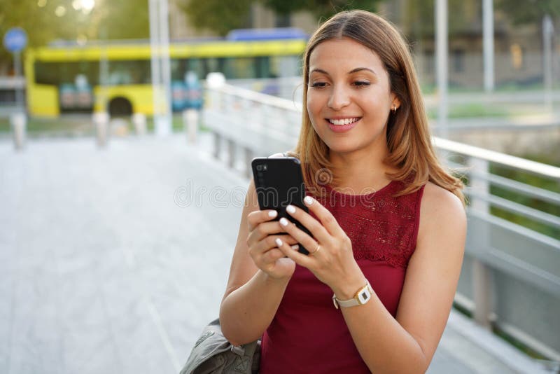 Attractive Girl Using Phone Outdoors Stock Image - Image of copy ...
