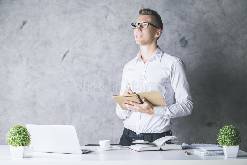 Attractive Guy with Notepad Stock Photo - Image of paper, adult: 83694418