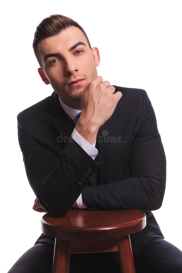 Attractive Guy in Suit with Hands on Chair Stock Image - Image of hold ...