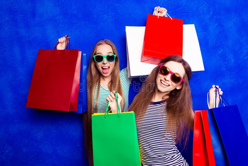 Attractive Happy Customers with Packets of Clothes after Shopping Stock ...