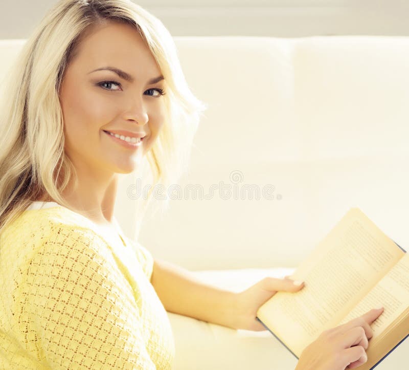 Attractive Happy Girl with a Book at Home. Stock Photo - Image of ...