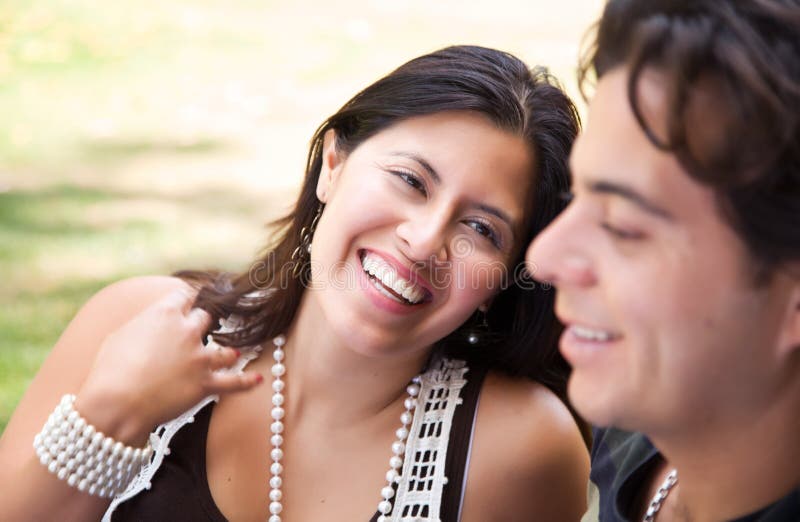 Attractive Hispanic Couple at the Park Stock Image - Image of ...