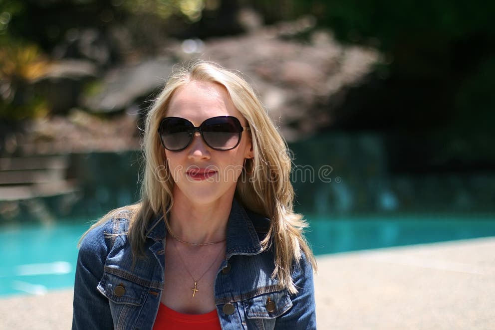 An Attractive Lady by the Pool Stock Photo - Image of woman, individual ...