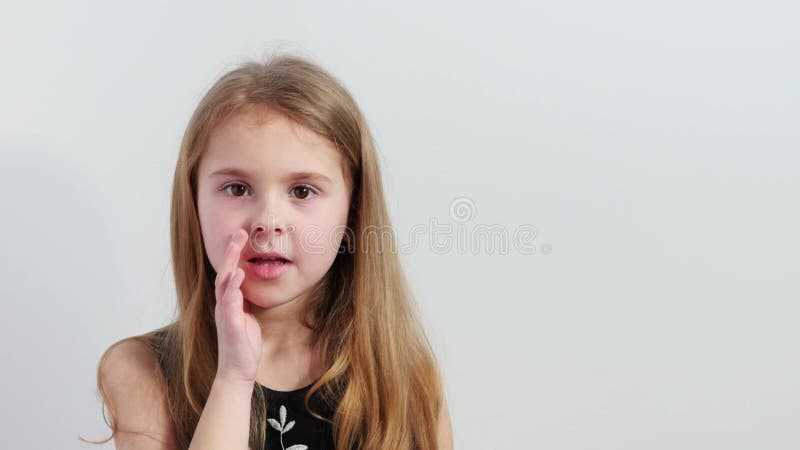 Attractive Little Girl Whispering into Camera. Stock Video - Video of ...