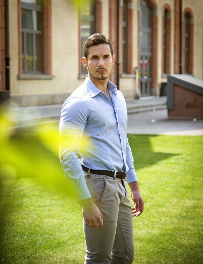 Attractive Male College Student Outdoors Standing on Grass Stock Image ...