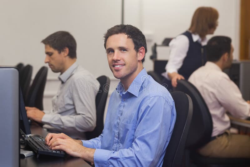 Attractive Male Student Sitting in Computer Class Stock Photo - Image ...