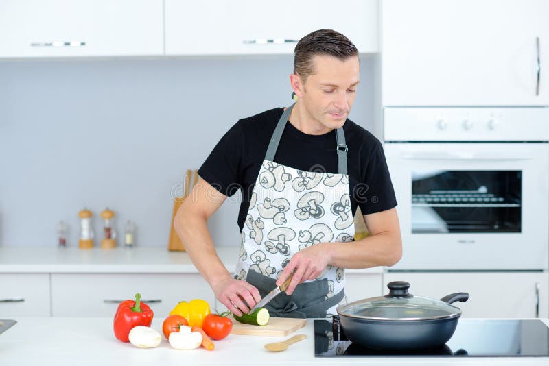 Man Cooking at Home Preparing Salad in Kitchen Stock Image - Image of ...
