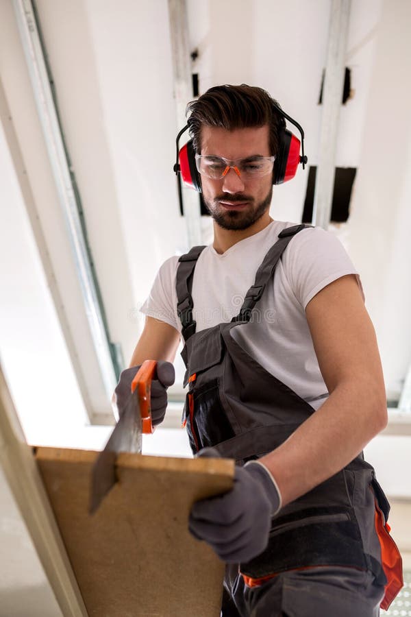 Attractive Man Doing Some Woodwork Stock Photo - Image of background ...