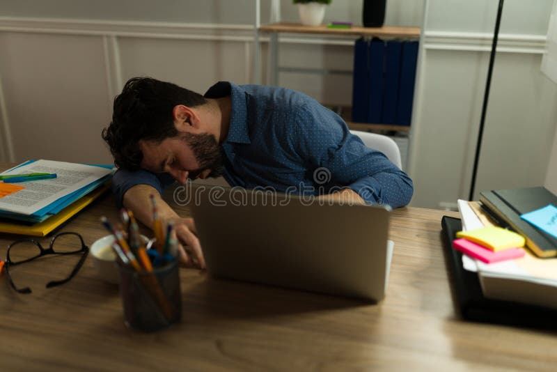 Attractive Man Feeling Exhausted at Work Stock Photo - Image of desk ...