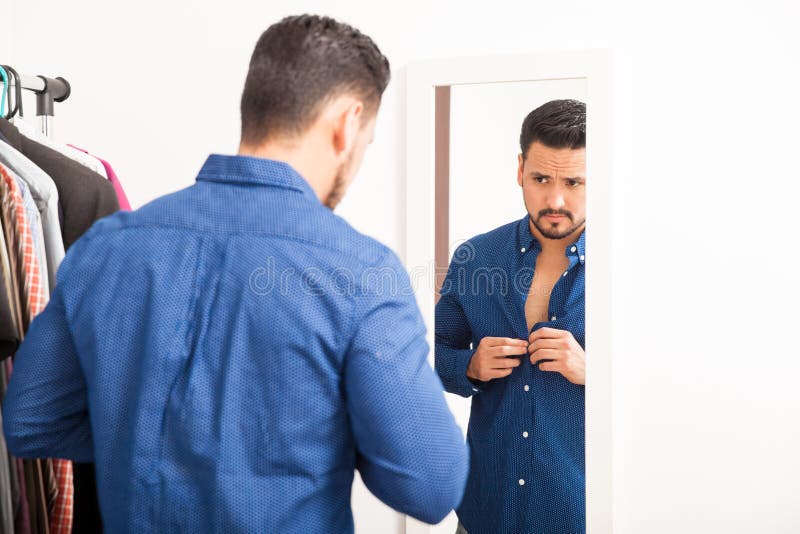 Attractive Man Getting Dressed Stock Image - Image of people, clothing: 70103551