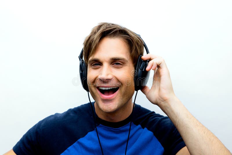 Attractive Man with Headphones Stock Image - Image of copy, closeup ...