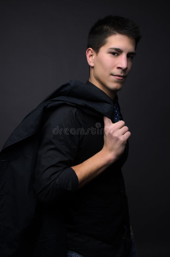 Attractive Man Holding a Jacket Stock Photo - Image of attractive ...