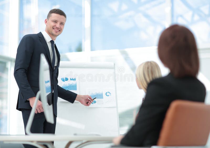 Attractive Man Making a Business Presentation To a Group Stock Photo ...