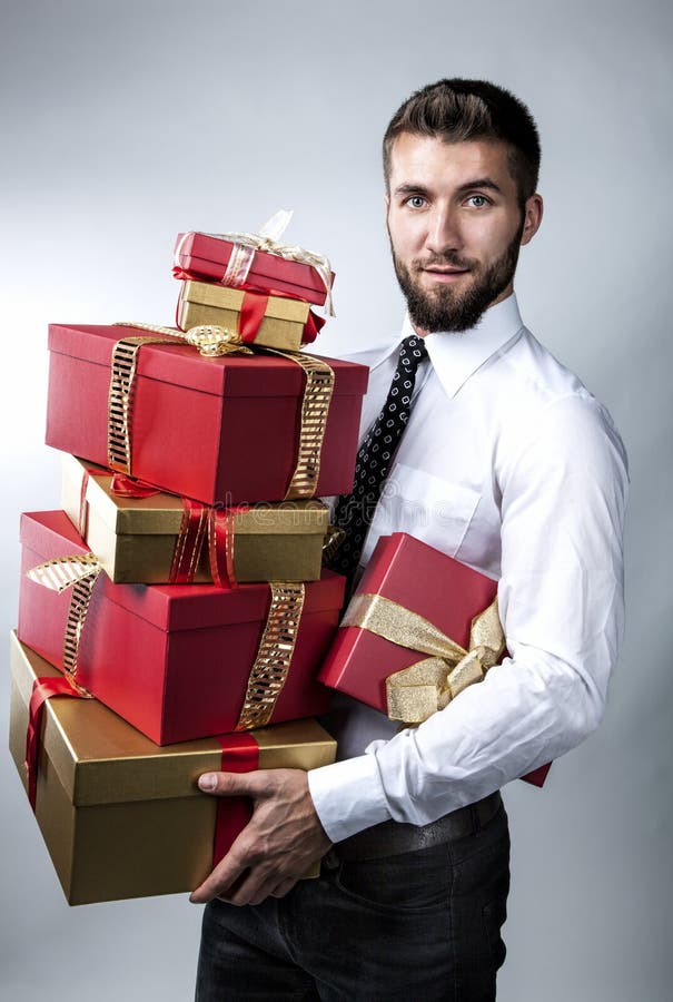 Attractive Man with Several Gift Packages Stock Image - Image of ...