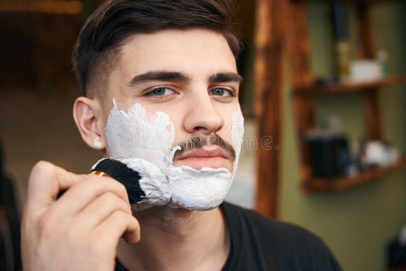 Attractive Man Shaving Himself at Workplace Stock Image - Image of ...