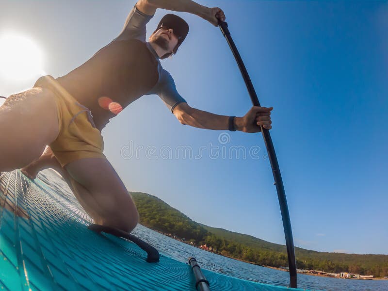 Attractive Man on Stand Up Paddle Board, SUP Stock Photo - Image of ...